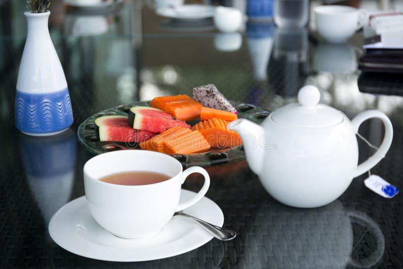 Cup of Tea and Tea Pot with Fresh Fruit Salad Stock Photo - Image of ...