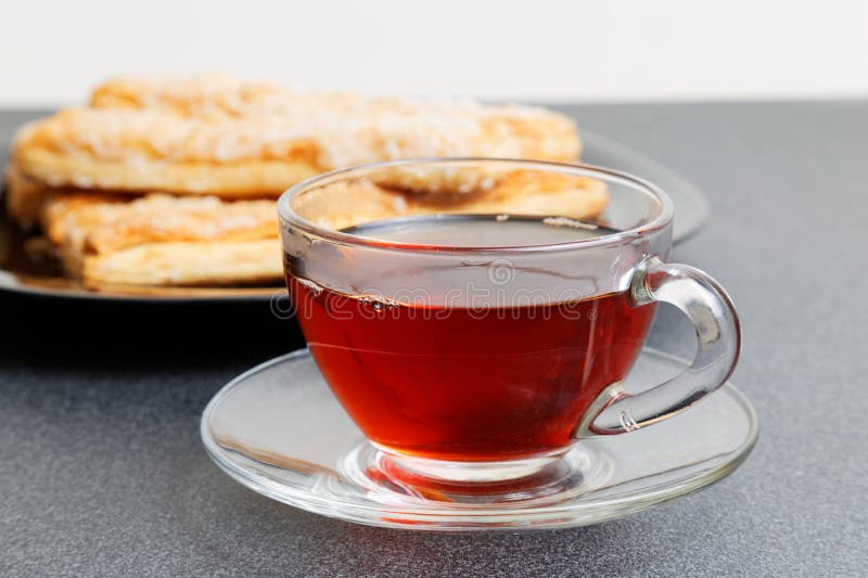 Cup of tea and puff pastry stock image. Image of pastry - 58949925
