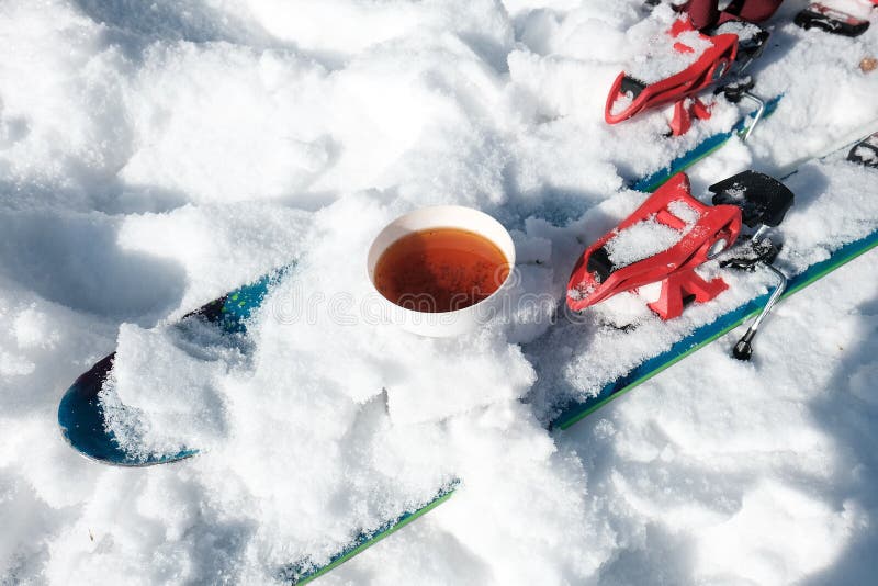Cup of Tea in the Snow and Ski Stock Image - Image of outdoor, season ...