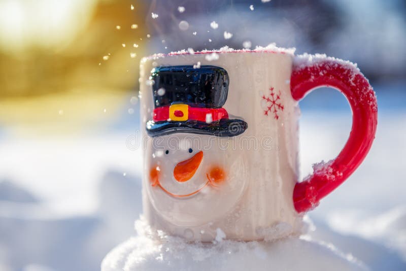 Cup of tea in the snow stock photo. Image of morning - 65357230