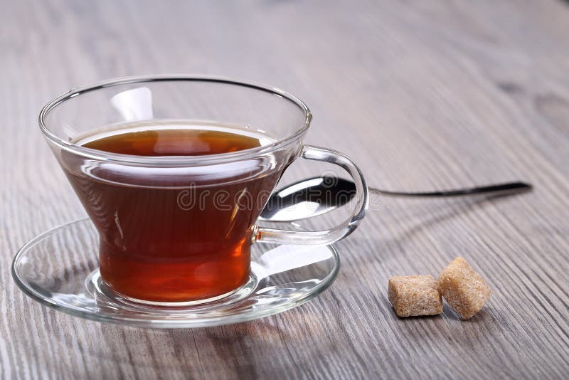 Cup with tea and sugar stock image. Image of black, teacup - 34361081