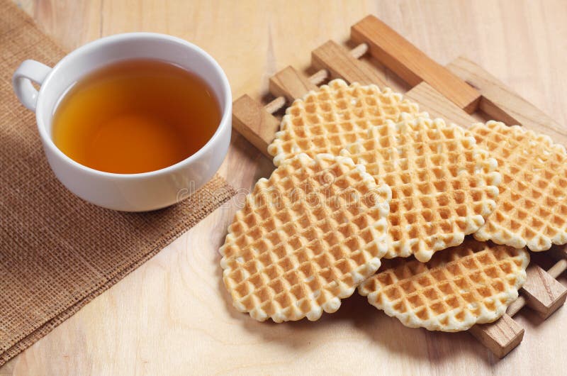 Tea and sweet waffles stock image. Image of sweet, table - 117001475