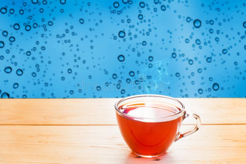 Cup of Tea on the Table on Window Water Drops. Stock Image - Image of ...