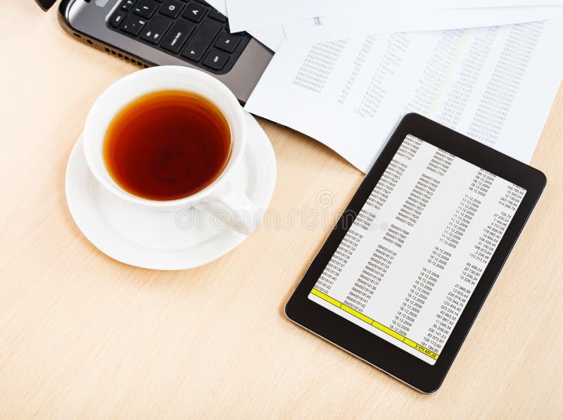 Cup of Tea and Tablet Pc on Office Desk Stock Image - Image of ...