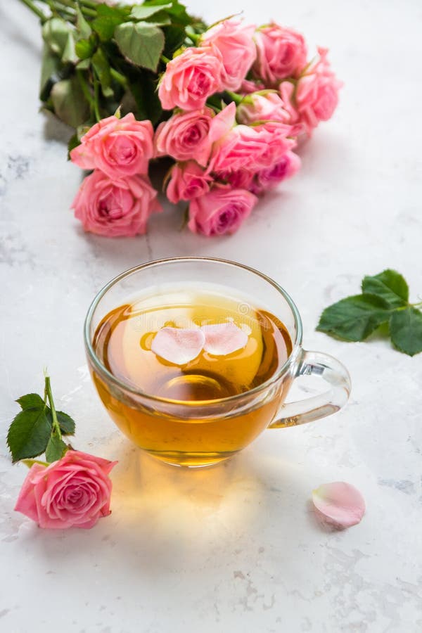 Cup of Tea and Tender Pink Roses on a White Background Stock Photo ...
