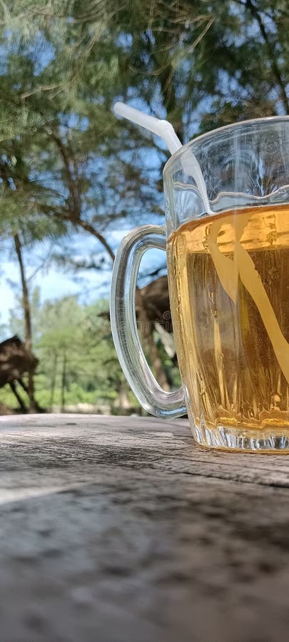 A Cup of Tea To Relieve Fatigue, Relax for a Moment on the Beach Stock ...