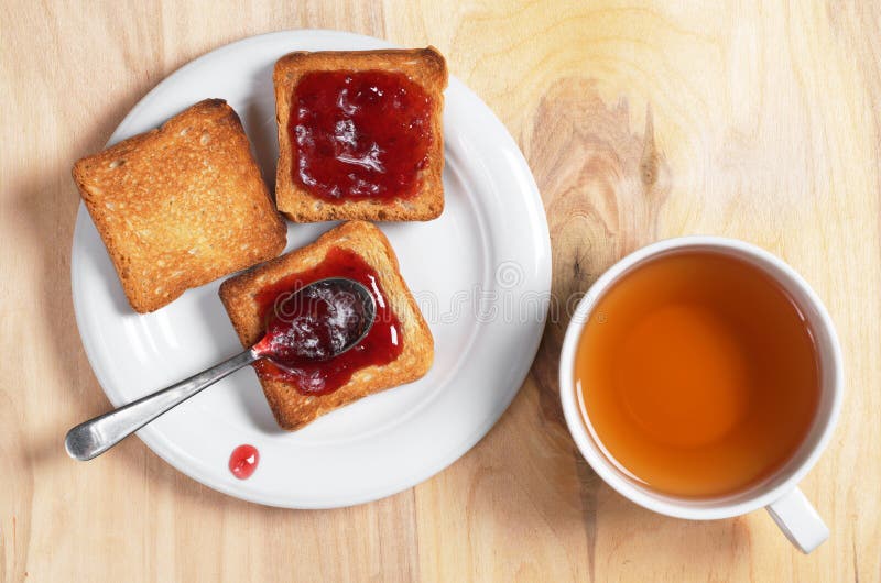 Cup of tea and toast bread stock photo. Image of table - 106990620