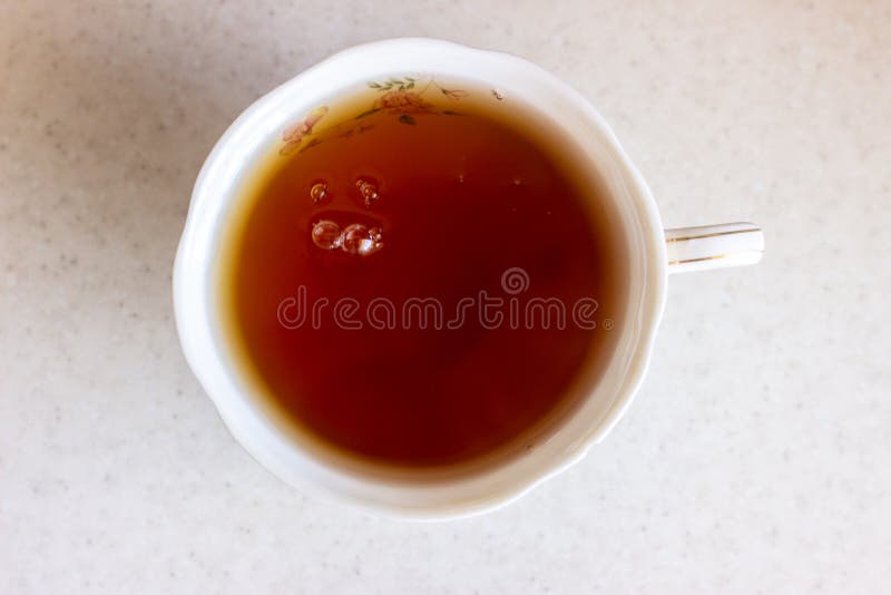 Cup of Tea on a Wood Table, Top View. a Cup of Tea Top View. Glass of ...