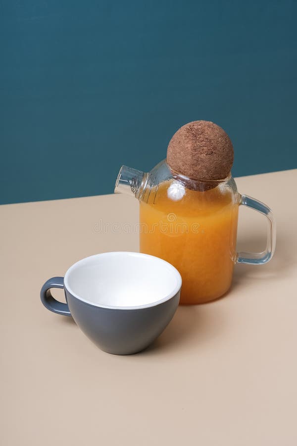 Cup and Teapot of Sea Buckthorn Tea. Minimalistic Still Life ...