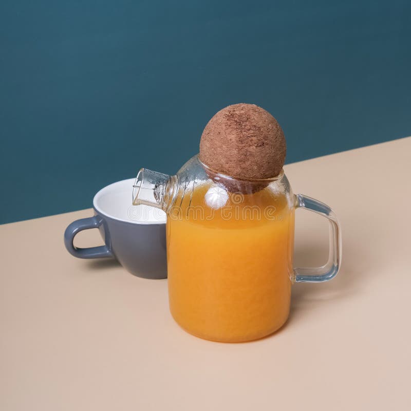 Cup and Teapot of Sea Buckthorn Tea. Minimalistic Still Life ...