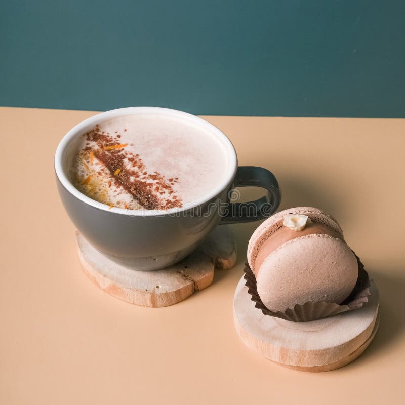 A Cup of Warm Cocoa with a Macaroon. Warm Drink for Cold Weather Stock ...