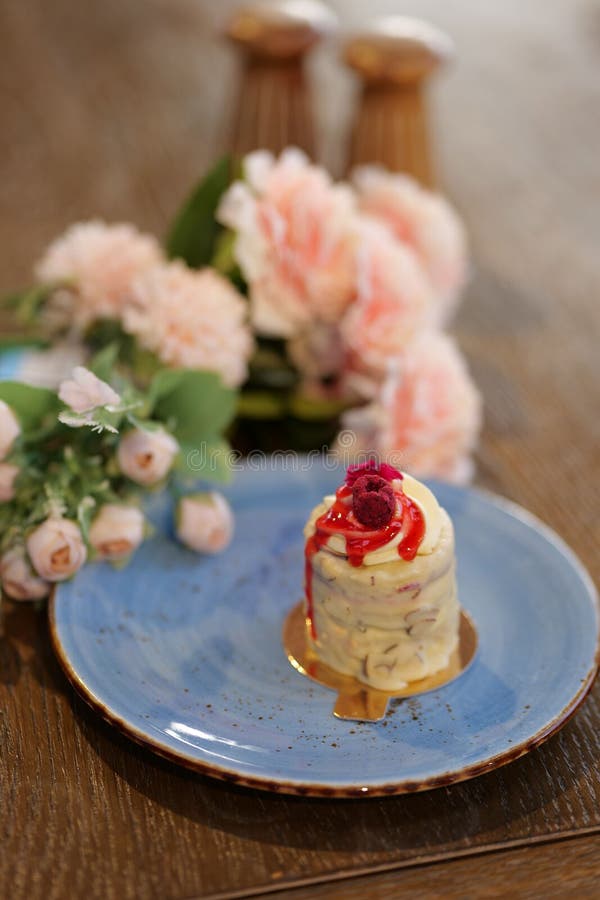 Cupcake Cake with Flower Design on a Plate Stock Image - Image of ...