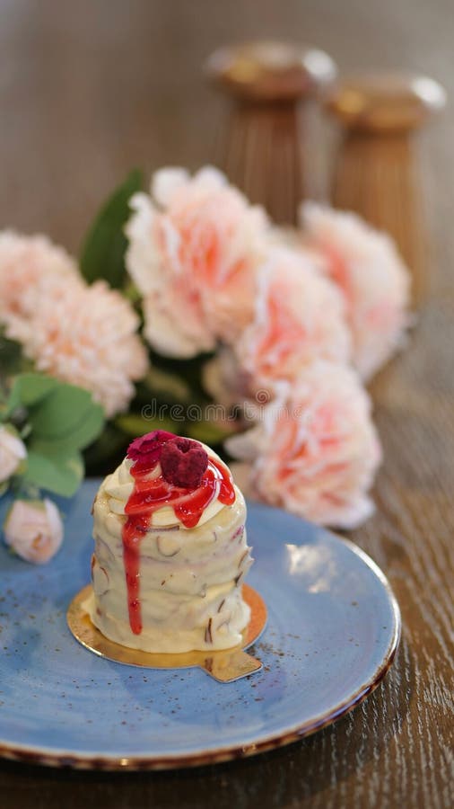 Cupcake Cake with Flower Design on a Plate Stock Photo - Image of ...