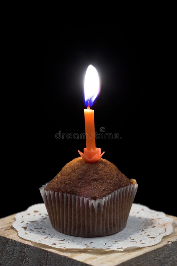 Cupcake with candle stock photo. Image of celebrate, dessert - 9703486