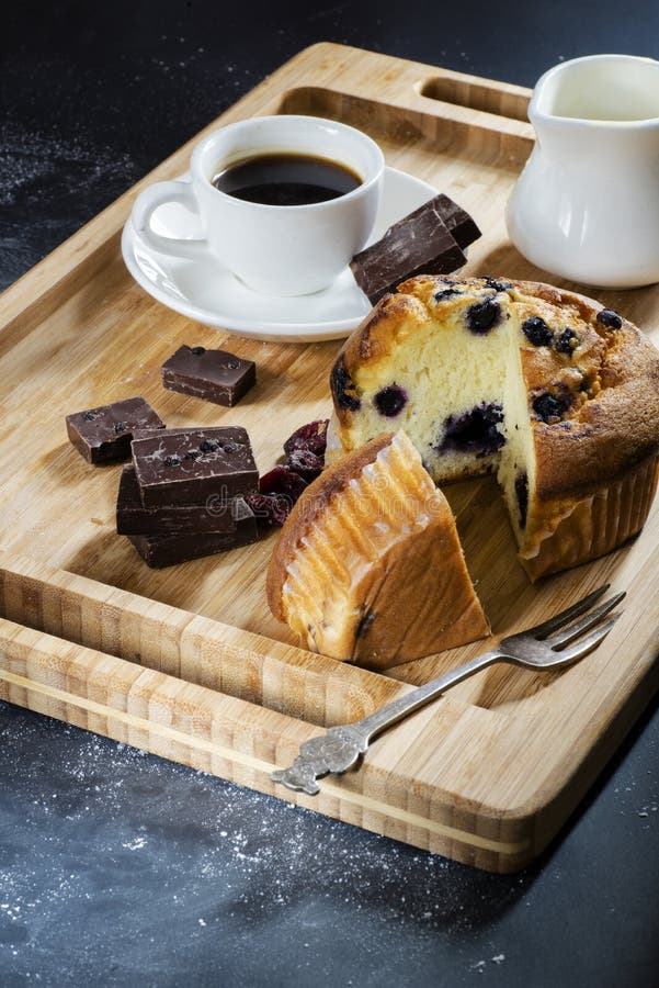 Cupcake and Coffee on Table Stock Photo - Image of cupcake, food: 141044842