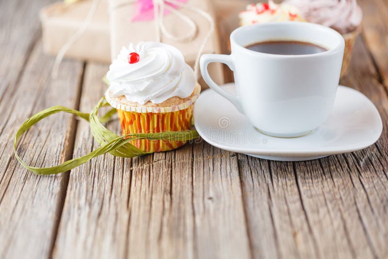 Cupcake and cup of coffee stock image. Image of eating - 67207377