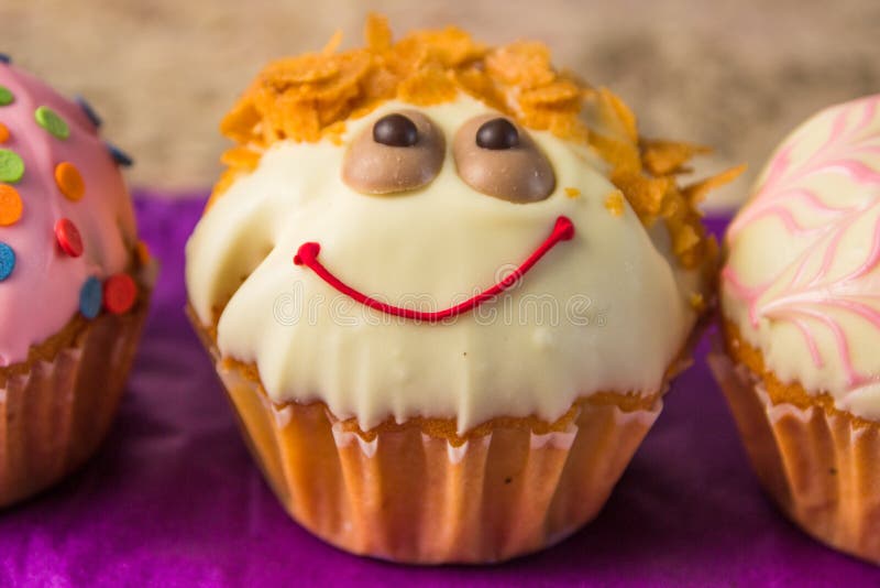 Cupcake with Face and Blossoming Apple Branches Stock Photo - Image of ...