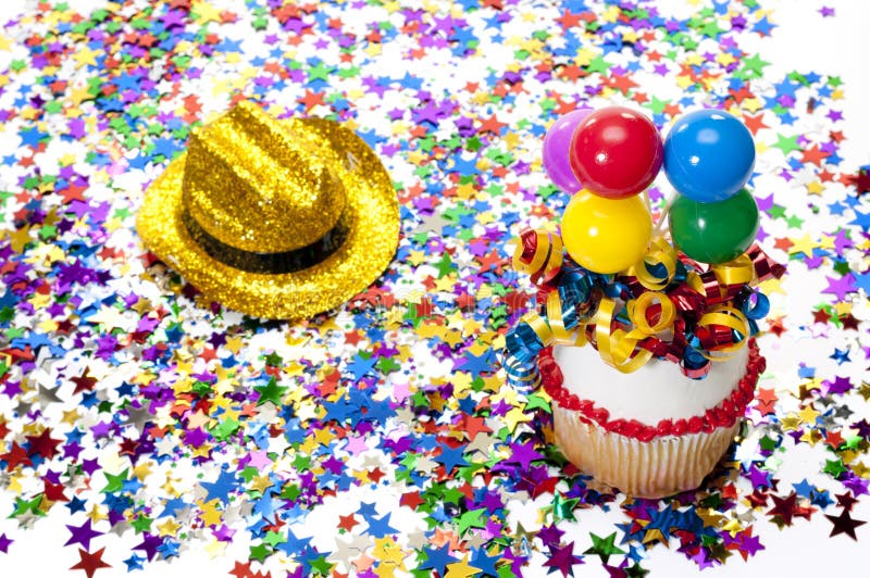 Cupcake, Hat, and Confetti at Party Stock Photo - Image of birthday ...