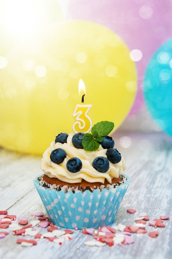 Cupcake with a Numeral Three Candle Stock Image - Image of burning ...