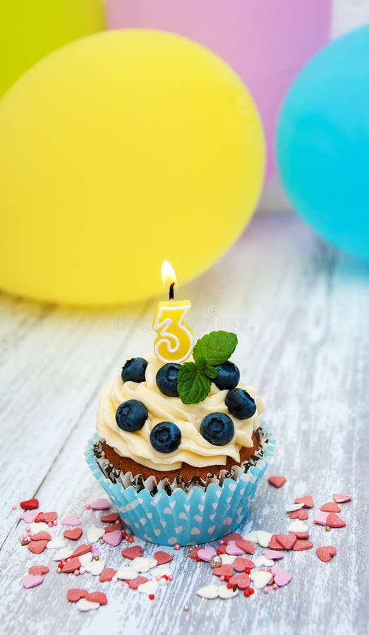 Cupcake with a Numeral Three Candle Stock Image - Image of fire ...