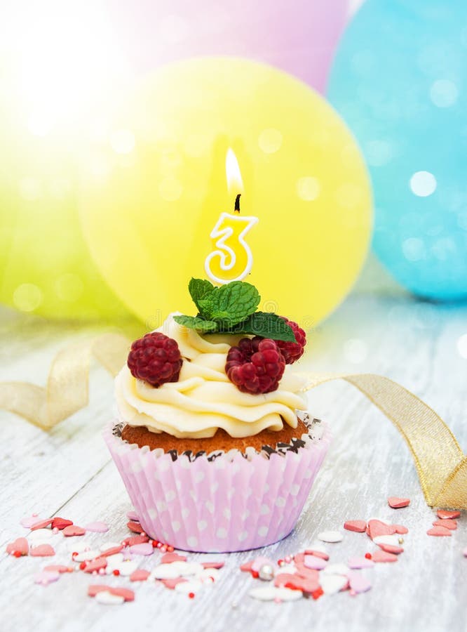 Cupcake with a Numeral Three Candle Stock Image - Image of green, flame ...