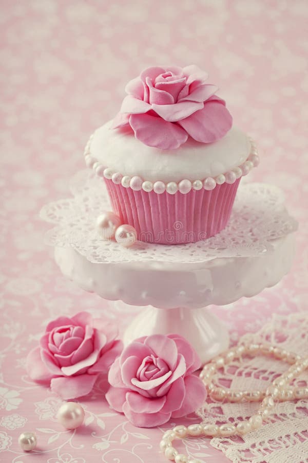 Cupcake with rose flower stock image. Image of frosting - 30851383