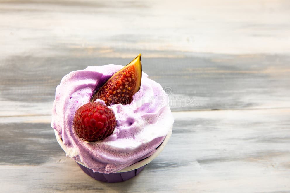 Cupcake with Whipped Cream, Raspberry and Fig Stock Photo - Image of ...