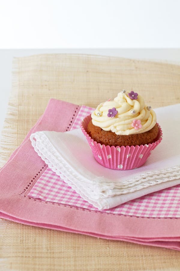 Cupcake with white icing stock photo. Image of single - 25858154