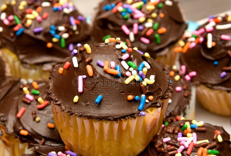 Multi-colored Cupcakes with Sprinkles Stock Photo - Image of frosting ...