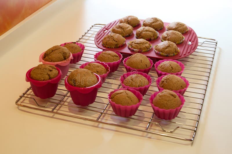 Cupcakes Baked in Their Silicone Molds on the Cooling Rack Stock Photo ...