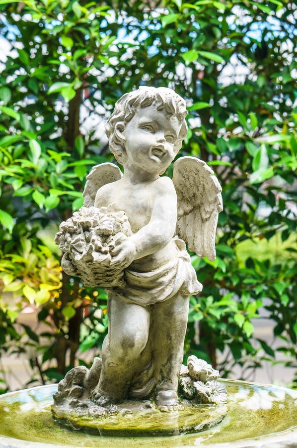 Cupid with Holding a Flower Stock Photo - Image of child, flower: 46448702