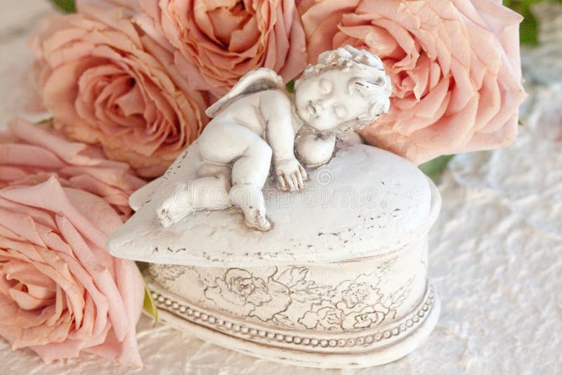 Cupid with Pink Roses stock photo. Image of valentines - 17406402