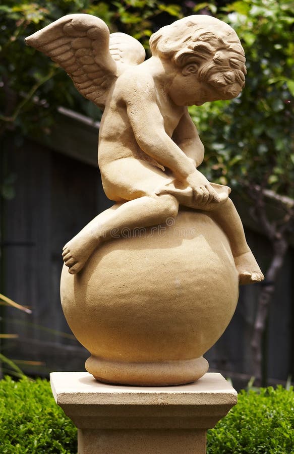 Cupid Statue stock image. Image of valentine, carving, figure - 384607
