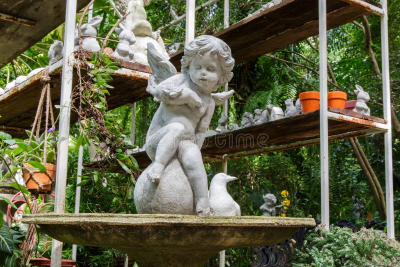 Cupid Statue stock photo. Image of solid, stone, arrow - 60532088