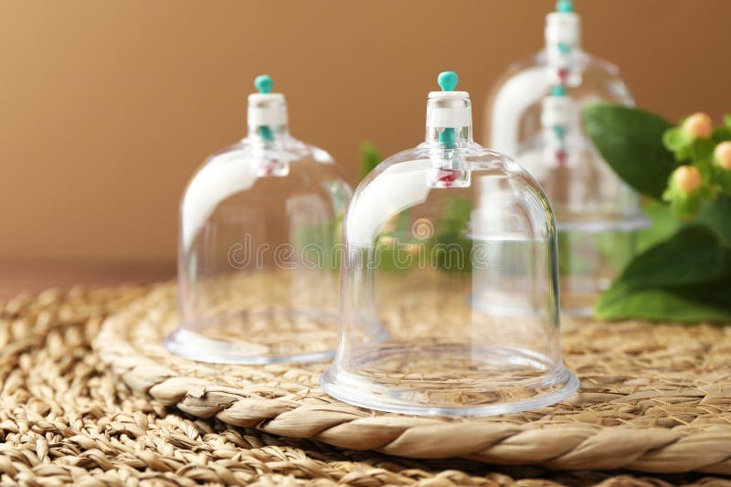 Cupping Therapy. Plastic Cup on Wicker Mat, Closeup Stock Image - Image ...