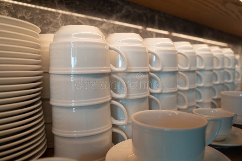 Cups Arranged Properly and Orderly Inside a Cupboard Stock Photo ...