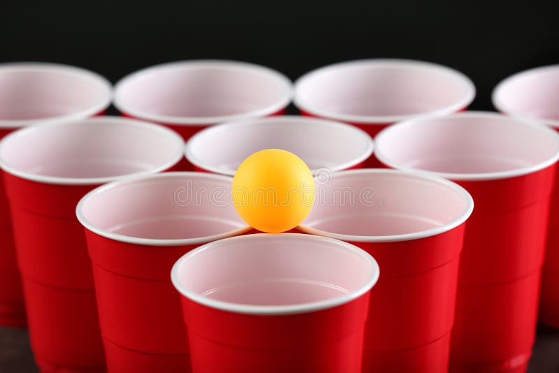 Cups and Ball for Beer Pong on Table, Closeup Stock Image - Image of ...