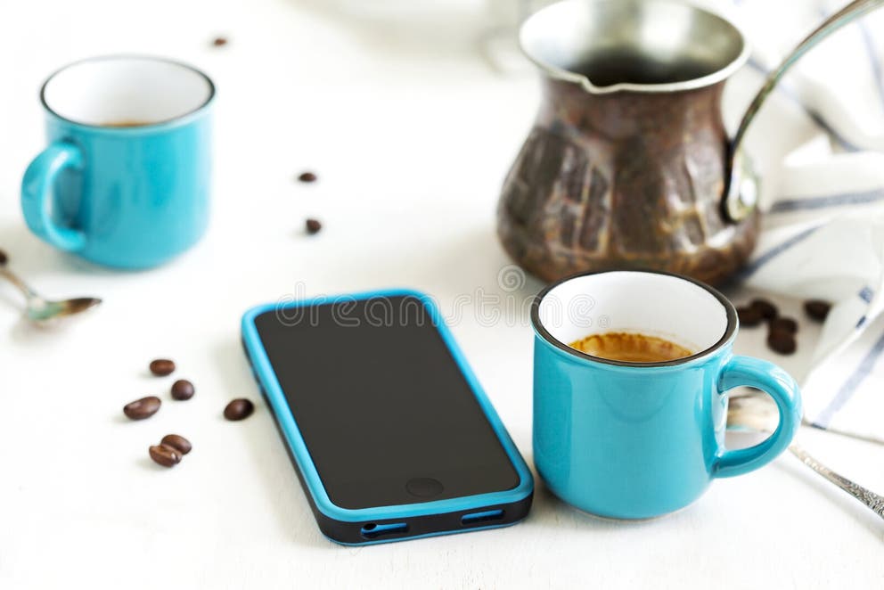 Cups of Coffee and Cellphone on Table Stock Photo - Image of bean ...