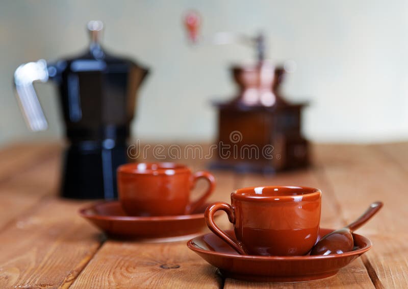 Cups of Coffee and a Coffee Pot on a Table Stock Photo - Image of still ...