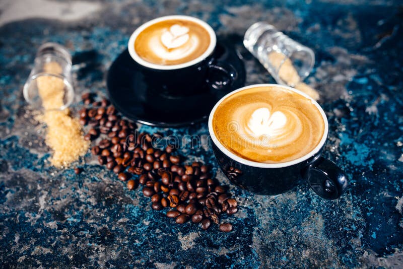 Cups of Coffee with Latte Art. Barista Pouring Coffee Stock Image ...