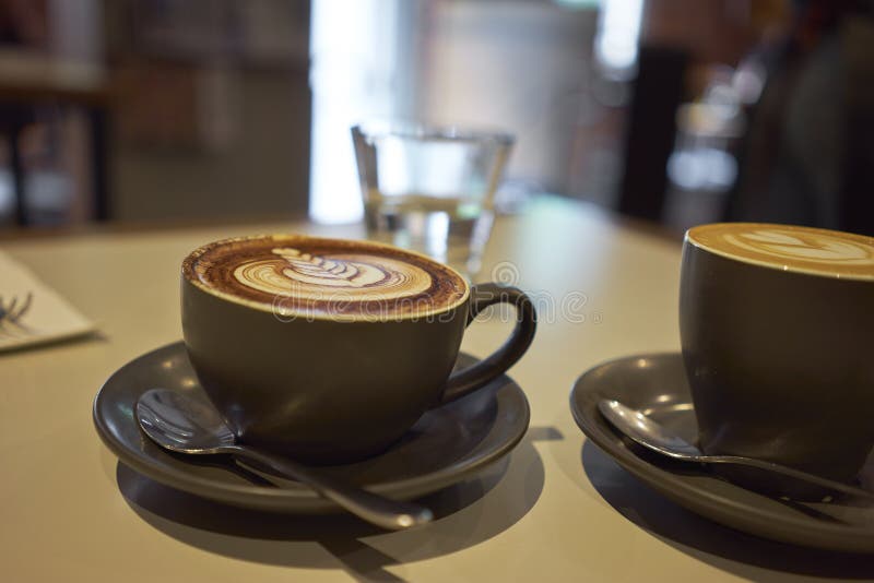 Cups of coffee on table stock photo. Image of table, spoon - 51135786
