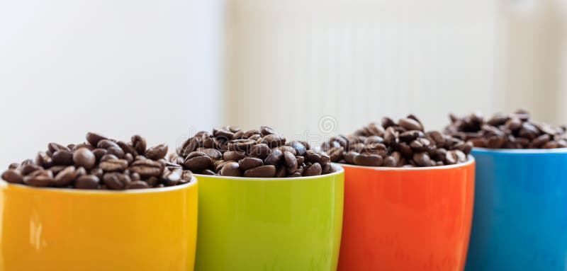 Cups full of coffee beans stock photo. Image of food - 76391596