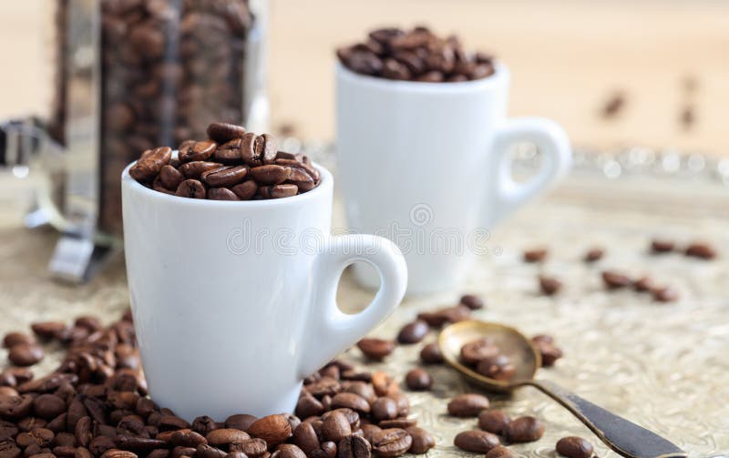Cups full of coffee beans stock image. Image of taste - 76391437