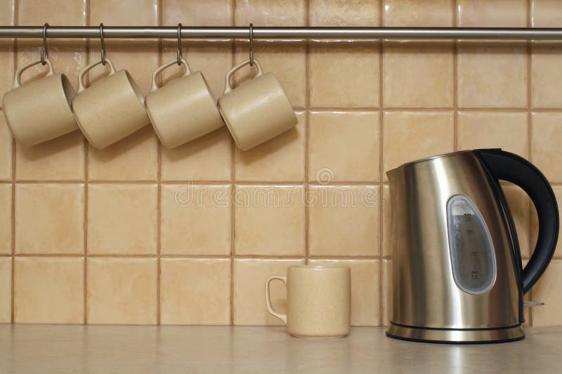 Cups and kettle stock photo. Image of mugs, handle, electric - 1719094
