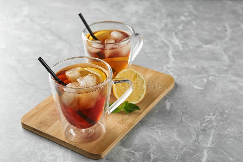 Cups of Refreshing Iced Tea on Table Stock Image - Image of healthy ...