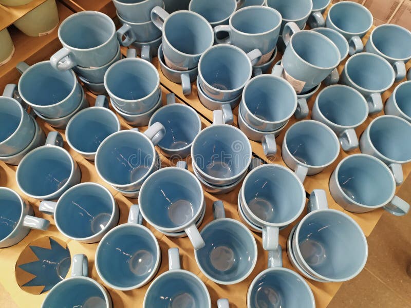 Cups for sale in a shop stock photo. Image of dish, shop - 193831214