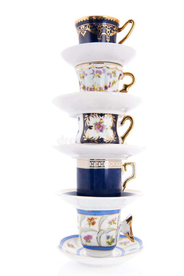 Stacked cups and saucers stock photo. Image of orange - 24858730