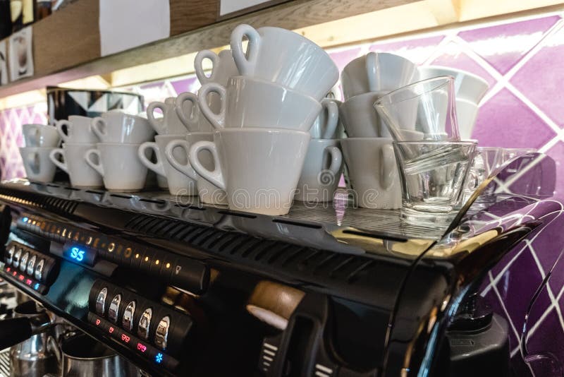 Cups Stacked in Espresso Machine in a Restaurant Stock Photo - Image of ...