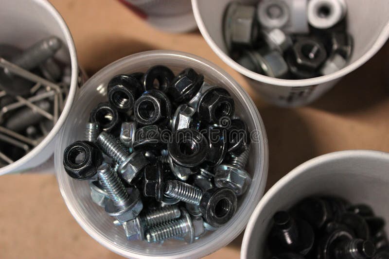 Cups with Variations of Disassembled Fixing Items at Home Workshop ...