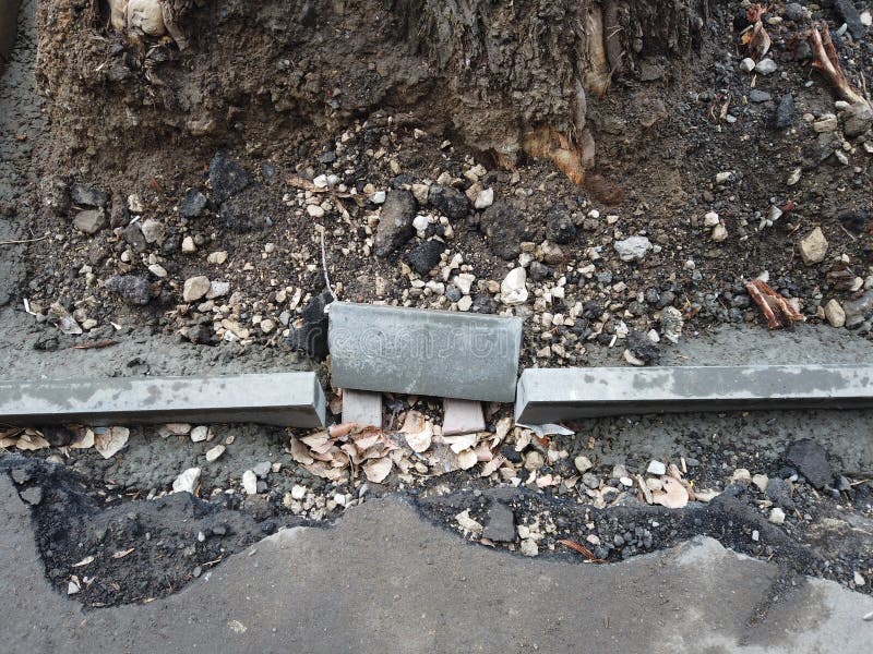 Curb Stone Installation. Damaged Asphalt Surface Stock Image - Image of ...